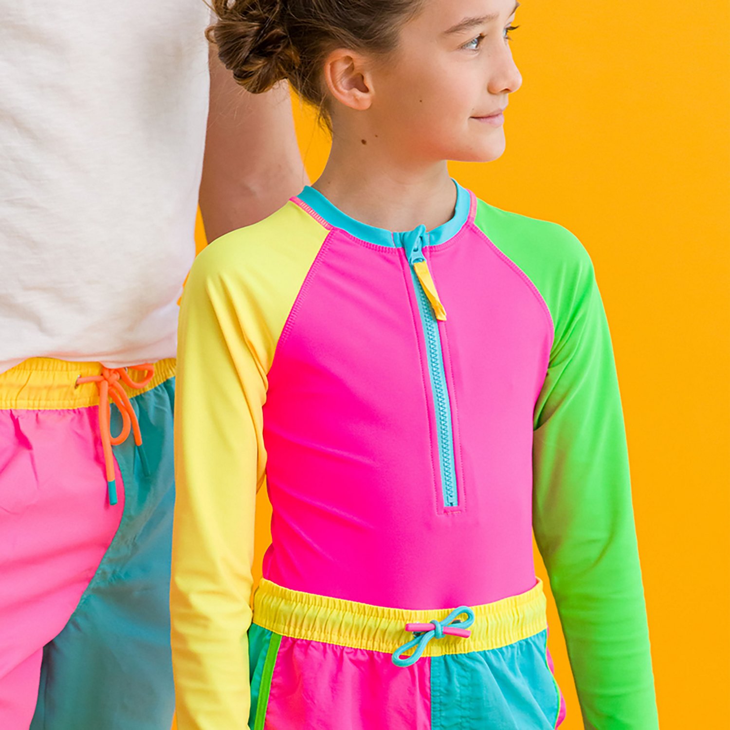 RuffleButts Girls' 4-7 Neon Color Block Long Sleeve Rash Guard | Academy